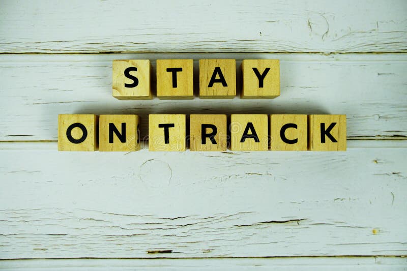Stay on Track with Wooden Blocks Alphabet Letters on Wooden Background ...