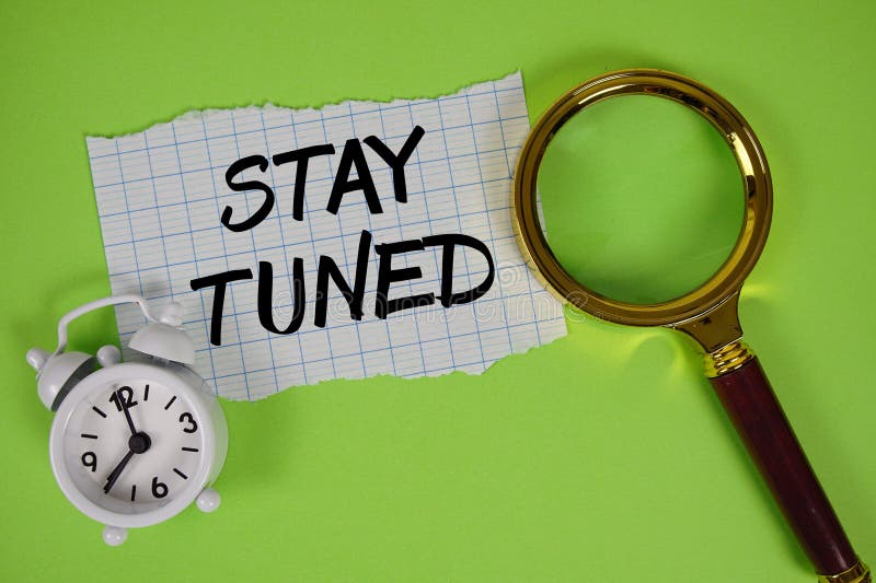 Stay Tuned Text Written on Paper with Magnifying Glass and Alarm Clock ...
