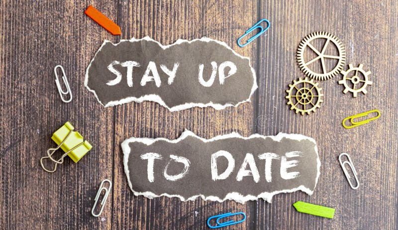 Stay Up To Date. Different Stationery and Text on Notepad Stock Photo ...