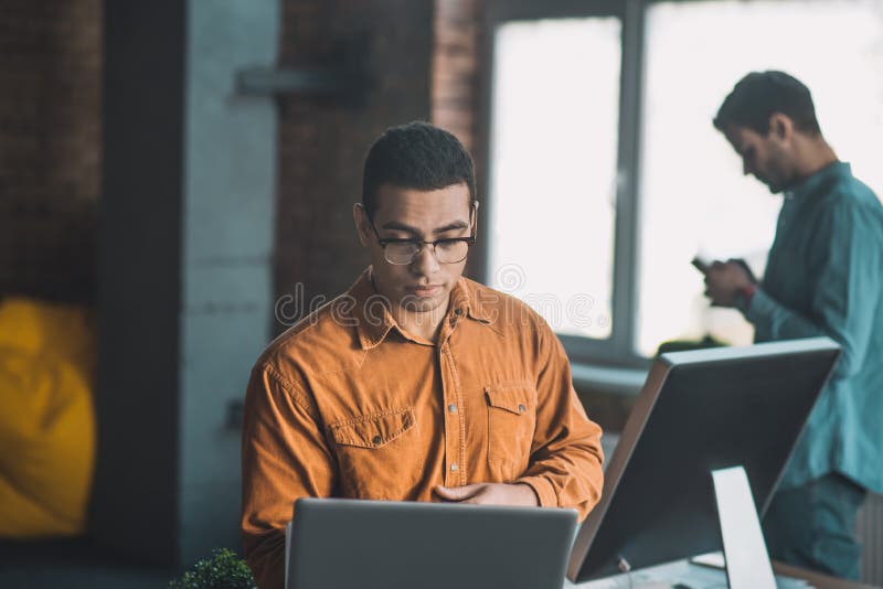 Smart Diligent Young Man Focusing on His Work Stock Photo - Image of ...