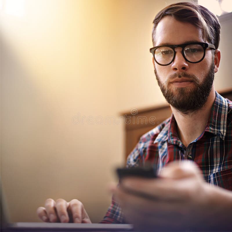 Staying Connected To His Contacts. a Trendy Young Man Using His ...