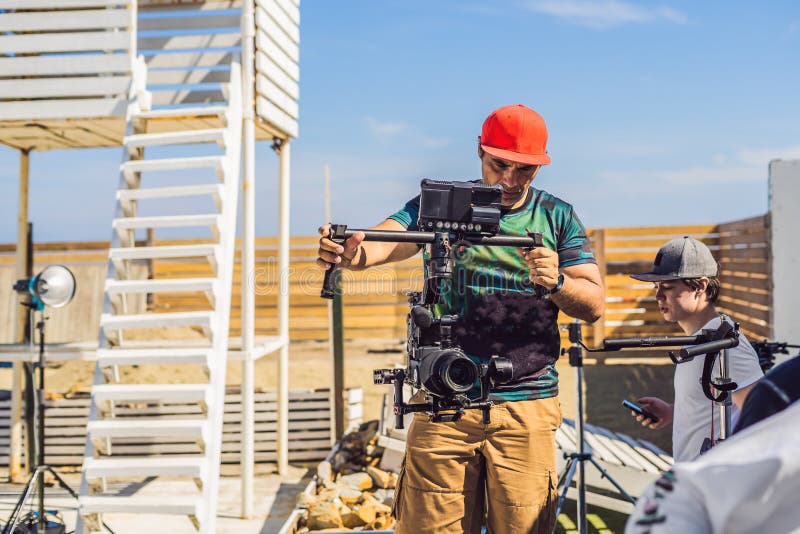 Steadicam Operator and His Assistant Prepare Camera and 3-axis ...