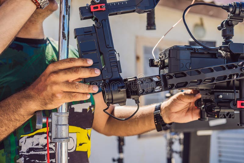 Steadicam Operator Prepare Camera and 3-axis Stabilizer-gimbal for a ...