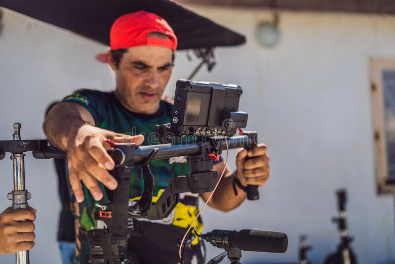 Steadicam Operator Prepare Camera and 3-axis Stabilizer-gimbal for a ...