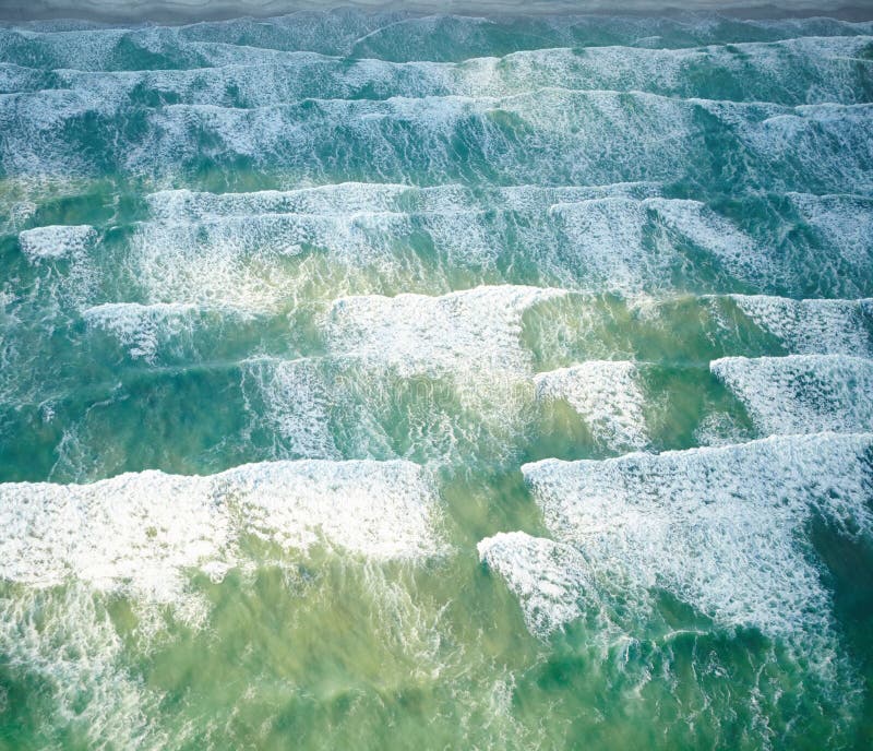 Steady Motion of the Ocean. Aerial View of Ocean Waves Moving Toward ...