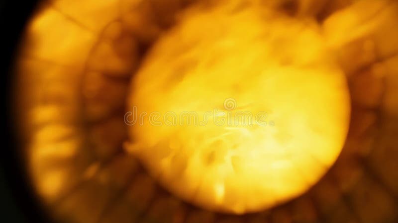 A Steady Stream of Goldenyellow Flames Flickering Behind the Turbines ...