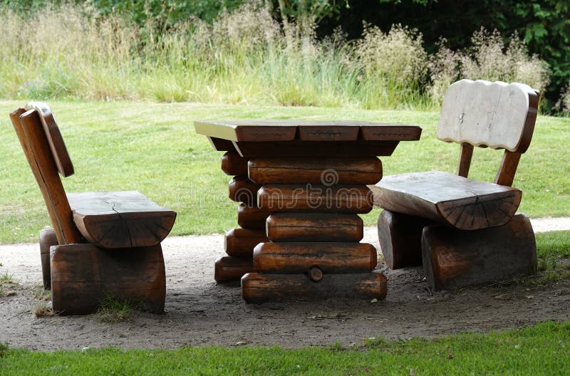 A steady table and benches stock photo. Image of outside - 250604050