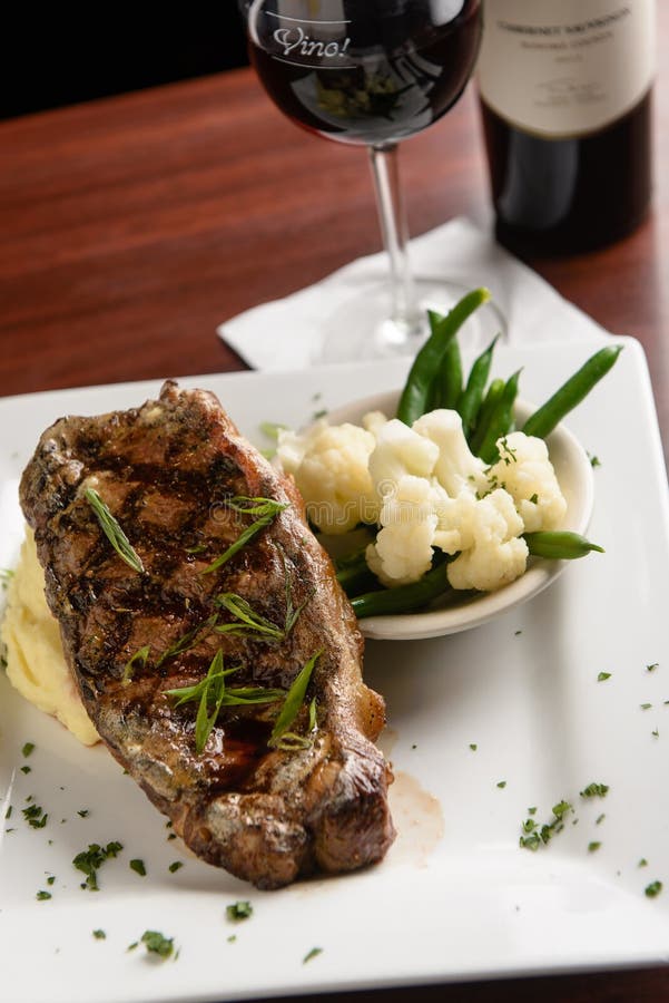 Rib Eye Steak Dinner 4 stock photo. Image of glass, pasta - 1910476