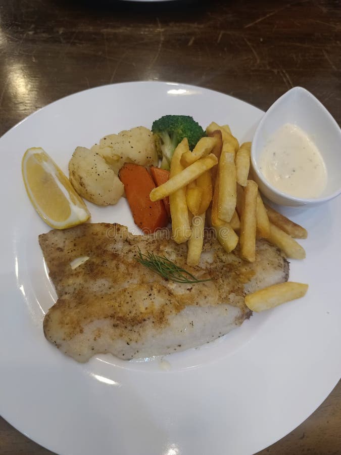Steak Dori Fish with Vegetables and Chips Stock Image - Image of dori ...