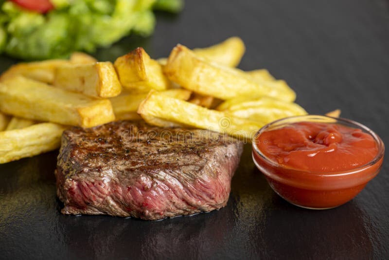 Steak with fries stock image. Image of ingredient, green - 265785663