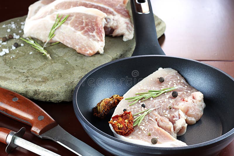 Steak in a frying pan stock photo. Image of beefsteak - 89473194