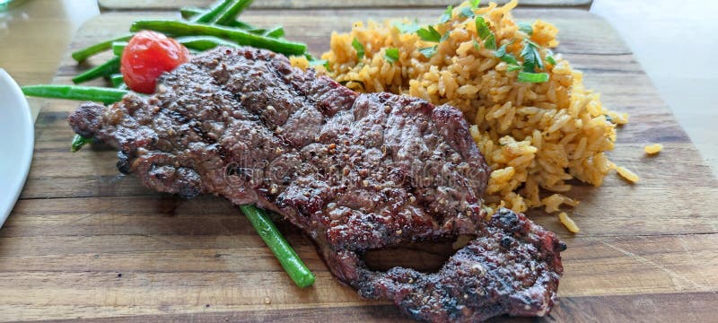 Steak and Java Rice in a Fine Dining Restaurant Stock Image - Image of ...