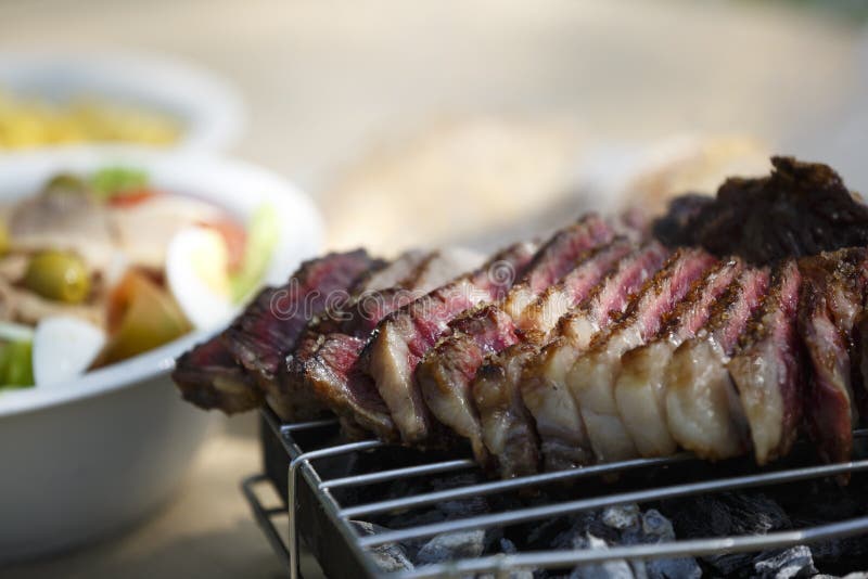 Steak at Outdoors stock image. Image of beef, grilled - 100840365