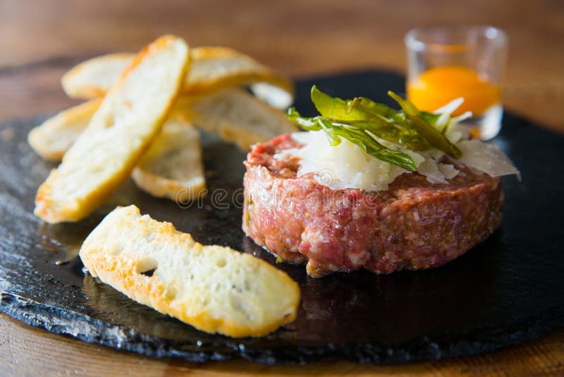Steak Tartar with egg. stock image. Image of yolk, meat - 264618351