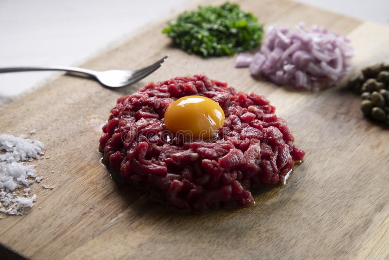 Steak Tartar with egg. stock photo. Image of ingredient - 264618452