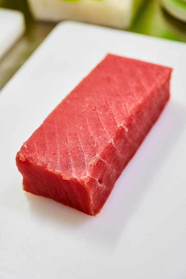 Steak of Tuna Fish Fillet on a Cutting Board - Fish and Seafood Stock ...