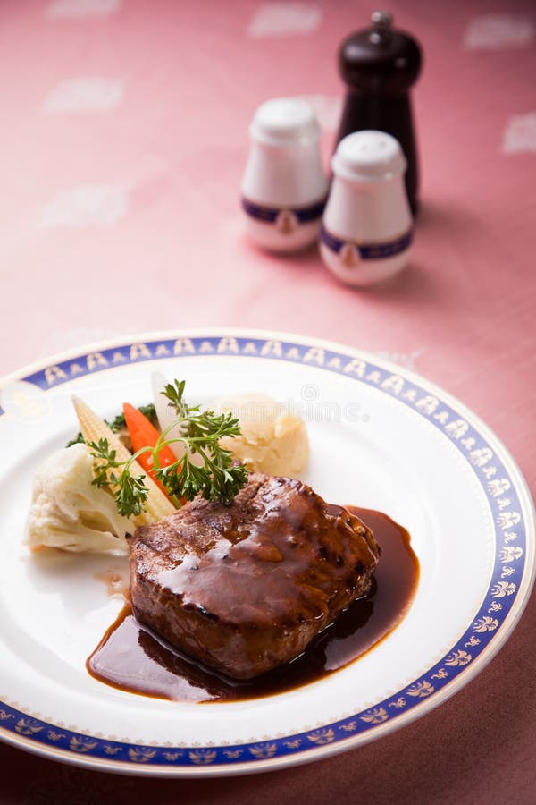 Steak with Vegetables and Red Sauce Stock Photo - Image of fillet ...