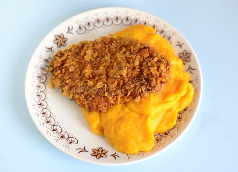 Steak Wrapped in Cornflakes with Pumpkin Puree Stock Photo - Image of ...