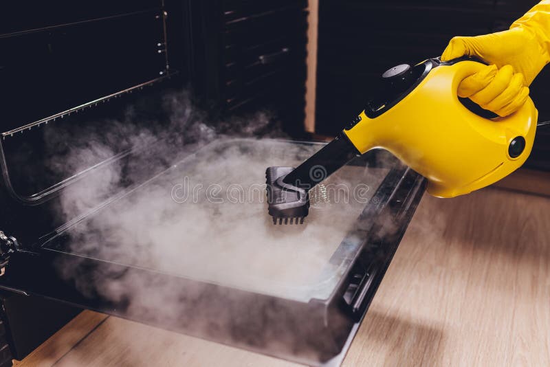 Steam Cleaning Oven House Cleaning Hand Close-up. Stock Photo - Image ...