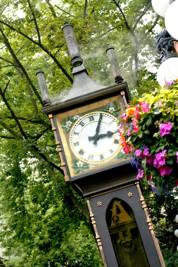 Steam Clock stock image. Image of vancouver, clock, flowers - 292355