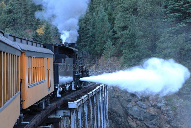 Steam Engine on Bridge in the Rocky Mountains Stock Image - Image of ...
