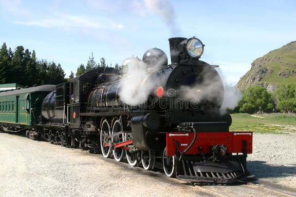 Steam Engine and Passenger Cars Stock Image - Image of railroad, tracks ...