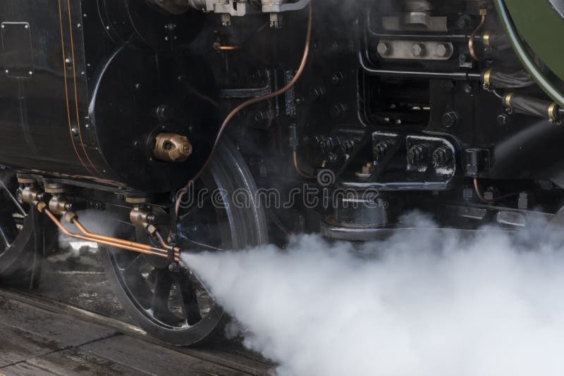 A steam engine`s wheel stock image. Image of travel - 102891693