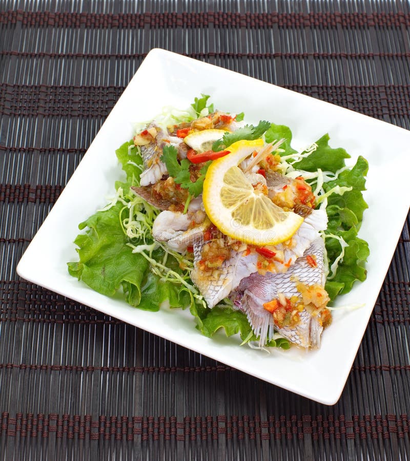 Steam fish in lemon sauce stock image. Image of boil - 42216841