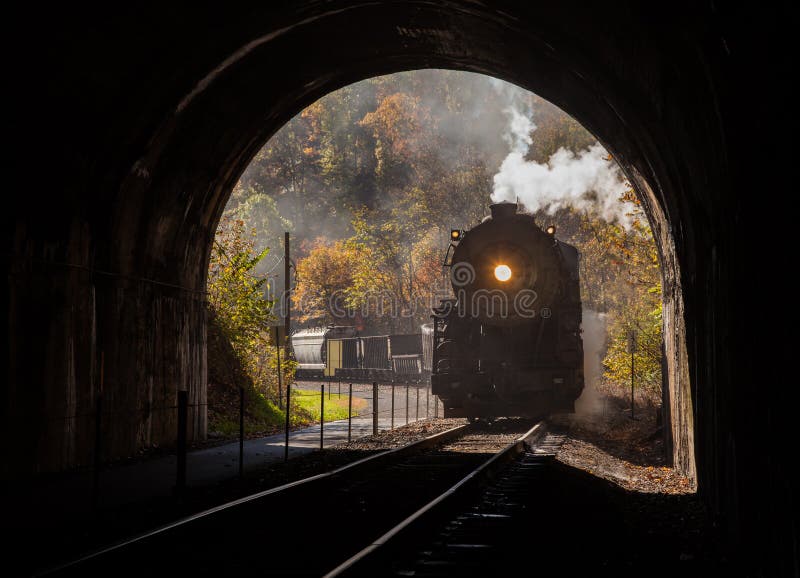 Oncoming Train with Railroad Crossing Sign Stock Photo - Image of loco ...