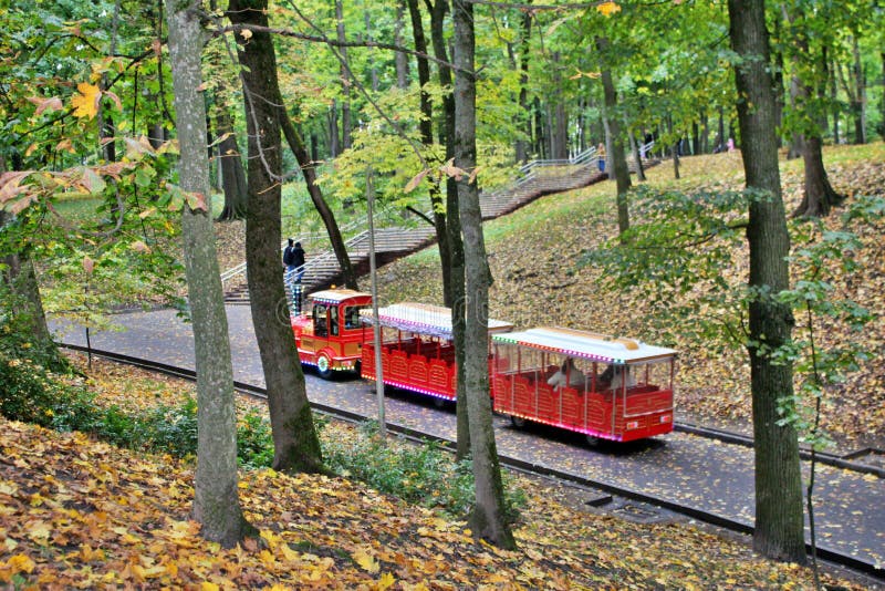 Steam Locomotive Rides Along the Path in the Park Stock Photo - Image ...