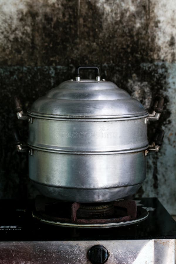 Steam over cooking pot stock image. Image of catering - 103813657