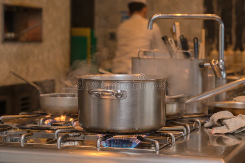 Steam on pot in kitchen stock photo. Image of commercial - 89006478