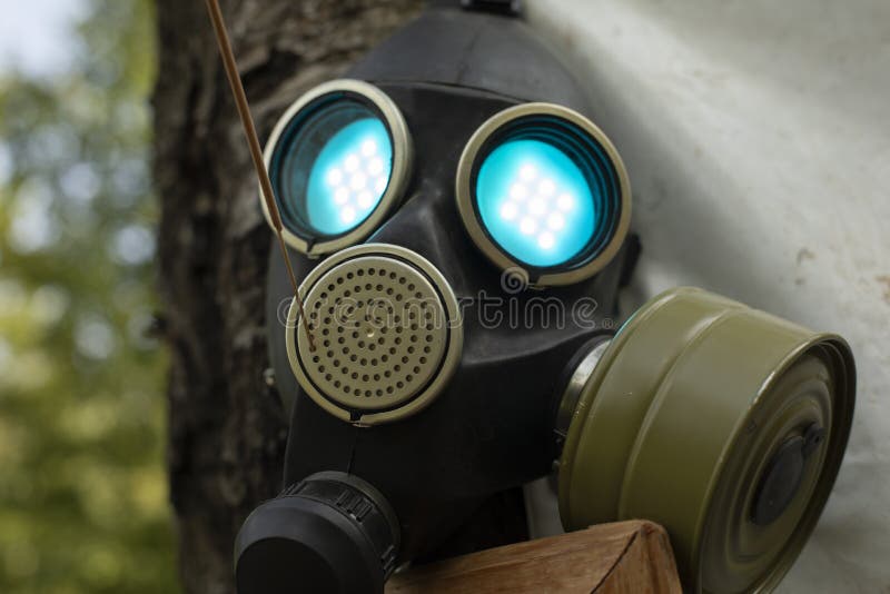 Steam Punk Gas Mask. Glowing Eyes at Mask. Mask on Face from Gas Stock ... Steam Punk Gas Mask. Glowing Eyes at Mask. Mask on Face from Gas Stock ...
