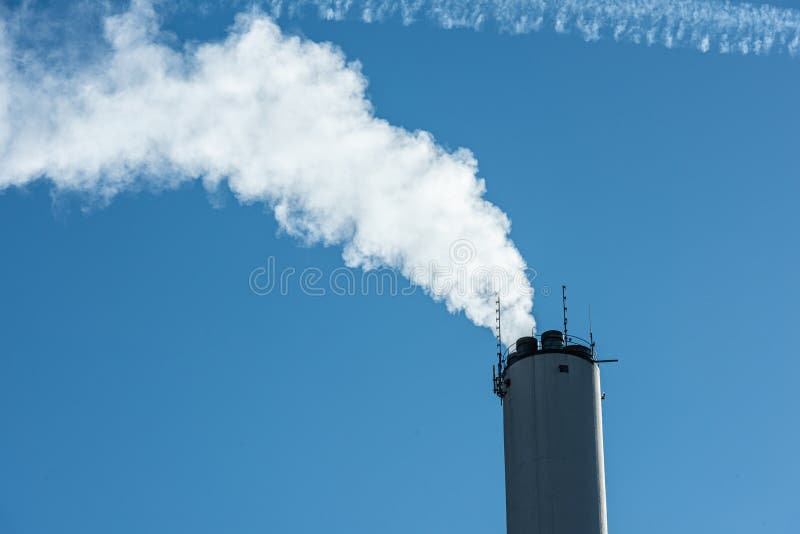 Steam Rising from Large Industrial Area on a Freezing Cold Winter Day ...