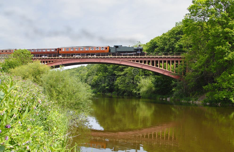 Steam train on bridge stock photo. Image of steam, england - 19769892