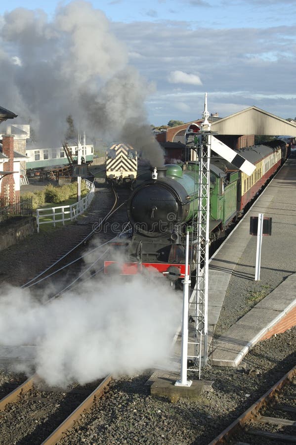 Steam Train Leaving Station Stock Photo - Image of clouds, travel: 16293070