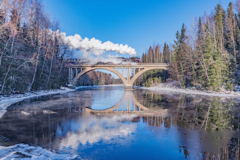 Steam Train Moves Above the River Stock Image - Image of creek, karelia ...