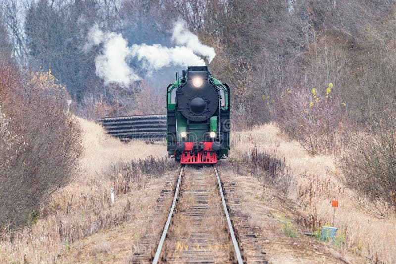 Steam Train Moves at Autumn Morning. Stock Photo - Image of passenger ...