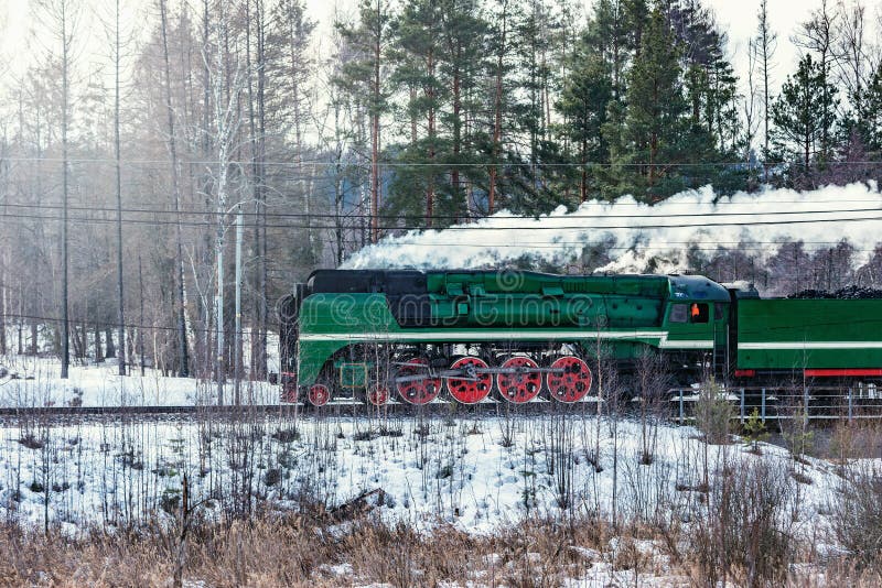 Steam train moves forward. stock image. Image of rail - 142805123