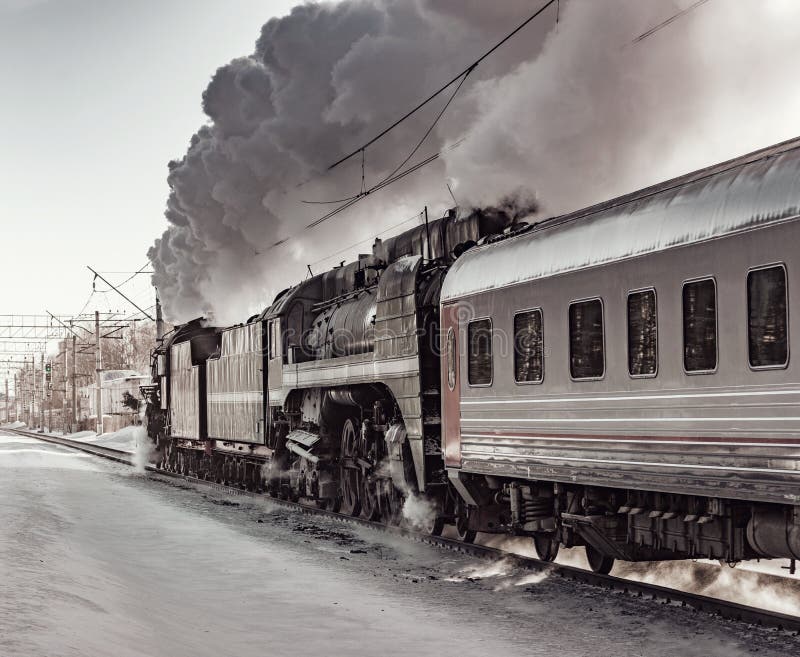 Steam train moves toward stock photo. Image of antique - 140912610