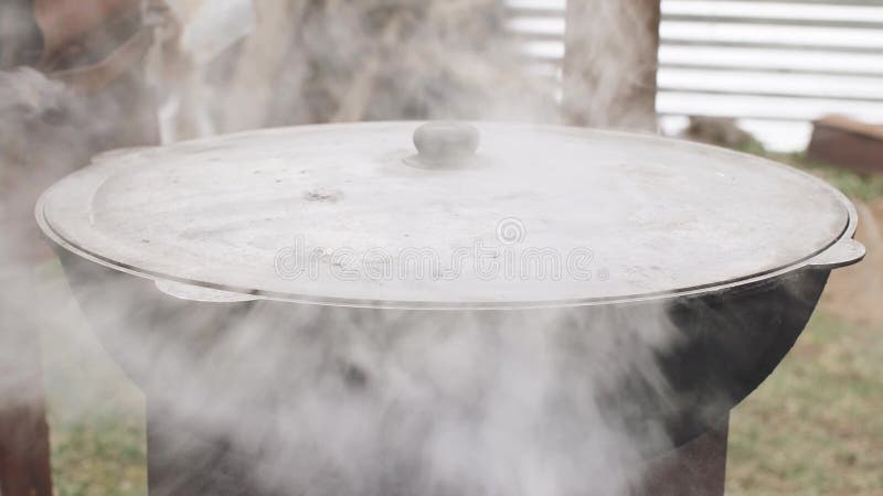 Steam from under the cover stock video. Video of aluminum - 179746213