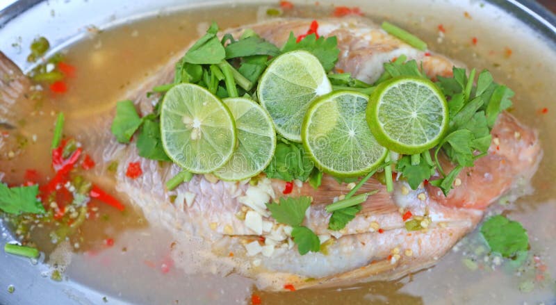 Steamed Basa Fish in Lime Dressing Stock Photo - Image of meal, lemon ...