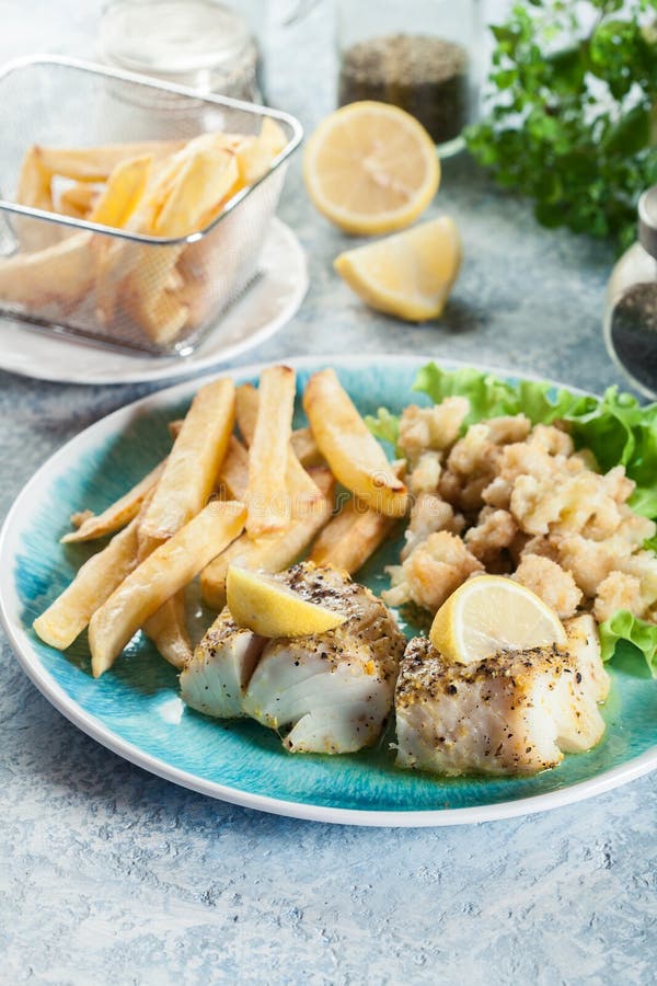 Steamed Cod Fish with French Fries and Boiled Cauliflower Stock Image ...