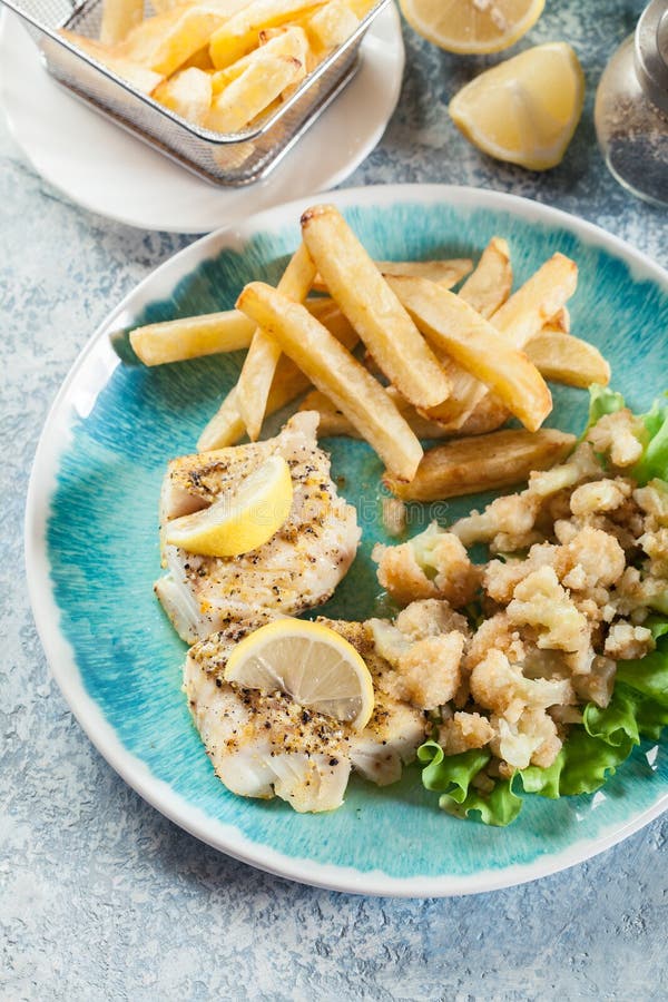 Steamed Cod Fish with French Fries and Boiled Cauliflower Stock Photo ...