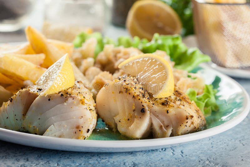 Steamed Cod Fish with French Fries and Boiled Cauliflower Stock Image ...