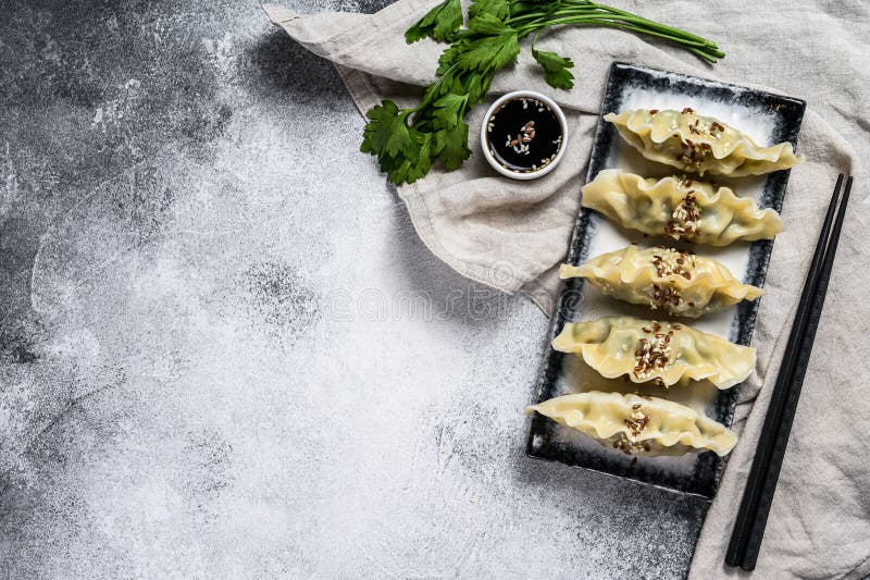 Steamed Dim Sum on a Ceramic Plate. Gray Background. Top View. Space ...
