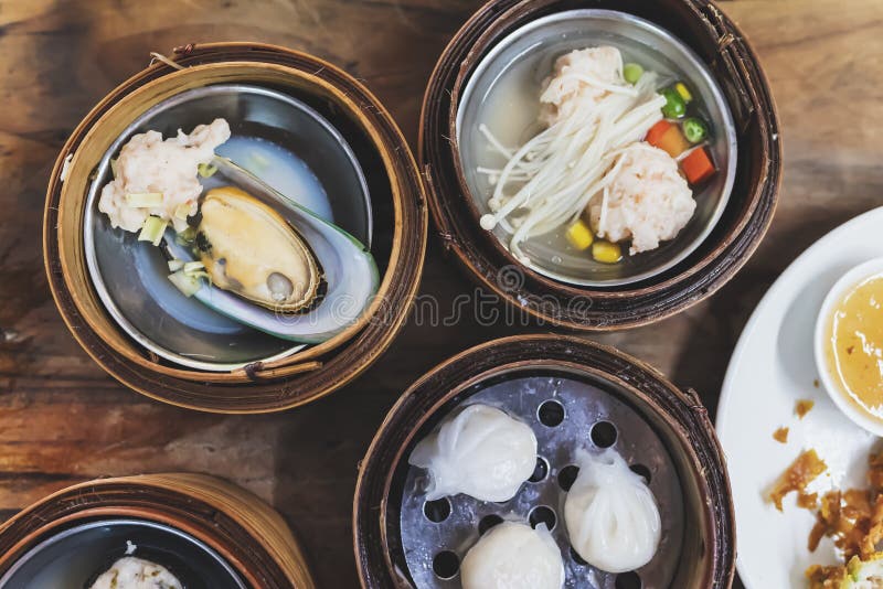 Steamed Dim Sum Packed in Bamboo Containers Stock Photo - Image of ...