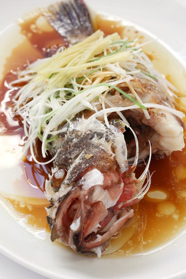 Steamed Fish with Soy Sauce, Ginger, Spring Onion and Chili Stock Image ...