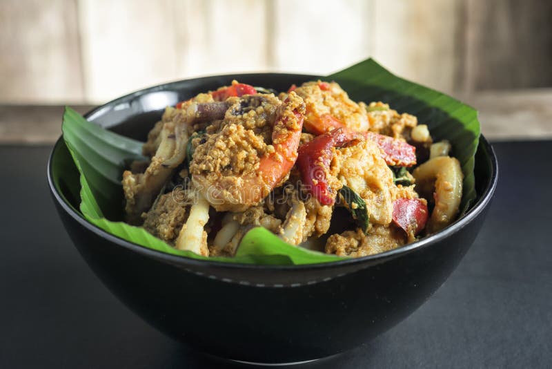 Steamed Fish with Curry Paste on Black Background. Stock Image - Image ...