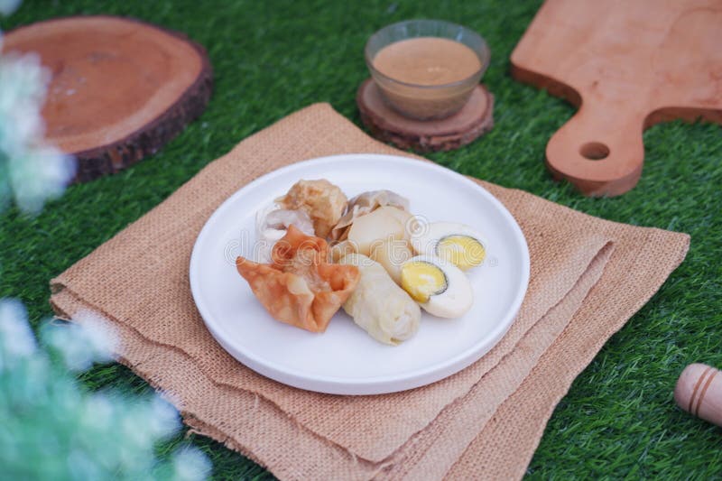 Steamed Fish Dumpling with Peanut Sauce Stock Photo - Image of copy ...